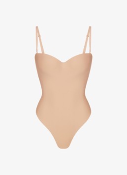 SKIMS Skims Body corrigerende stringbody met beugel • Beige ...