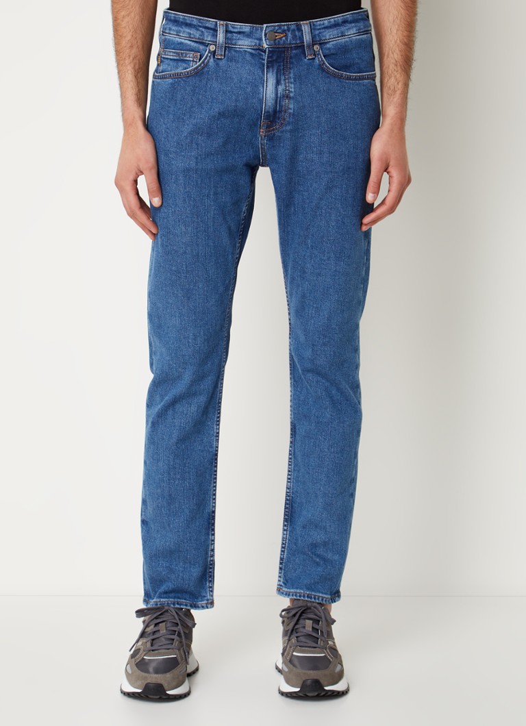 HUGO BOSS Delaware slim fit jeans met donkere wassing • Indigo ...