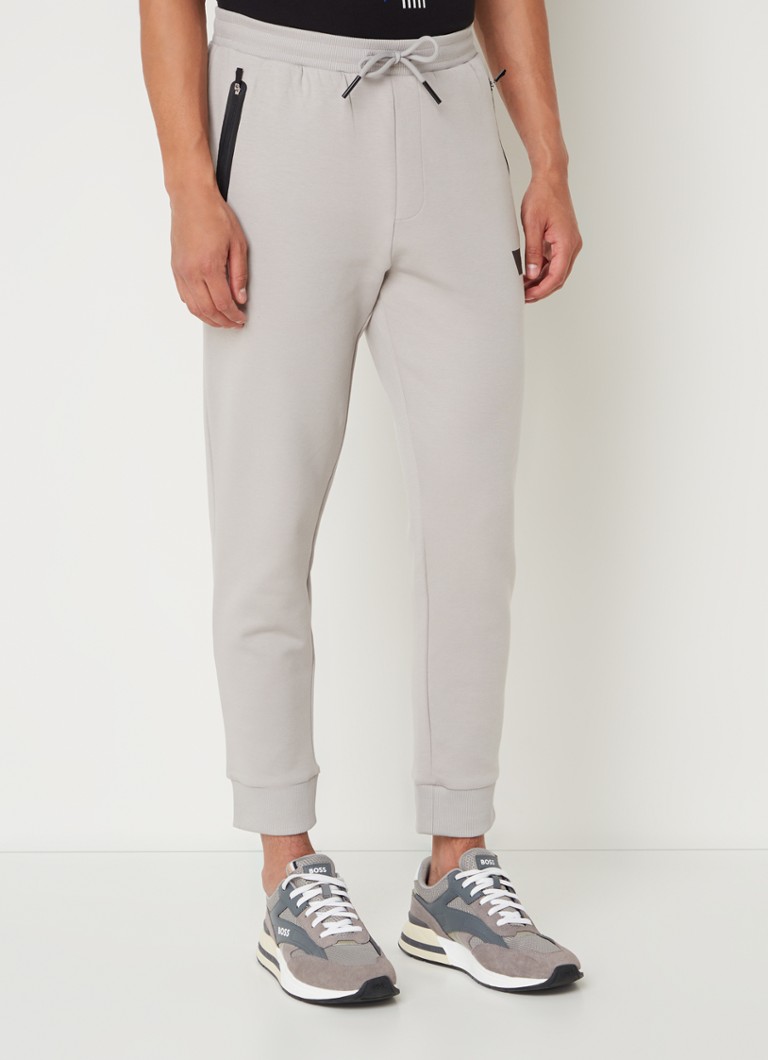 HUGO BOSS Hadiko tapered joggingbroek met ritszakken en logo ...