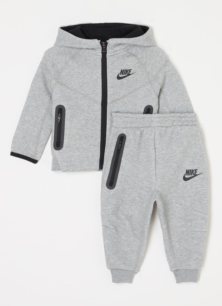 Nike Tech Fleece trainingspak met logo 2-delig • Grijs • deBijenkorf.be